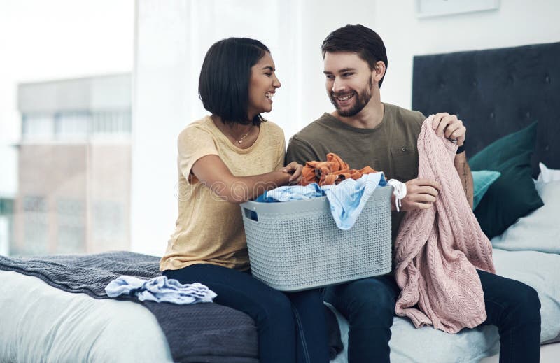 Getting through Married Life One Load at a Time. a Young Couple Doing ...