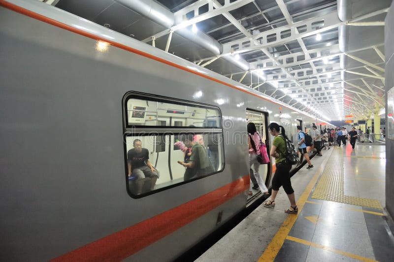 Getting on the Metro editorial stock image. Image of evening - 20456924