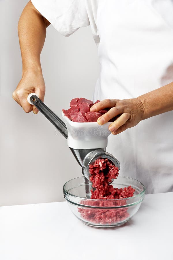Getting Minced Using a Meat Grinder Stock Photo - Image of herbs, meal ...