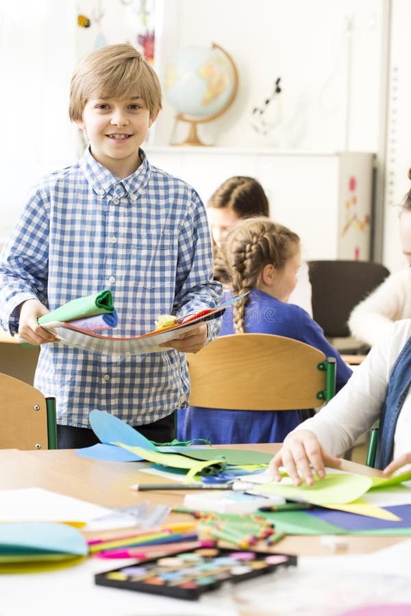Getting More and More Creative Stock Photo - Image of smile, desk: 69412464