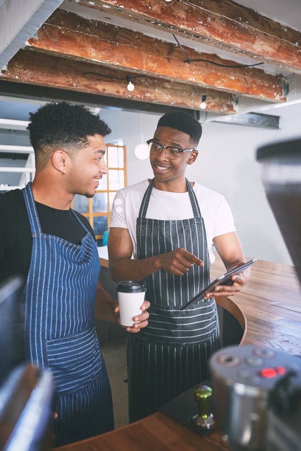 Getting Orders on the Move. a Handsome Young Man Driving a Forklift ...