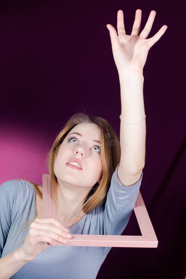 Getting Out of Frame Up by Beautiful Young Woman Stock Photo - Image of ...