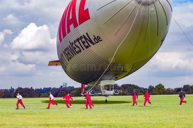 Airship, Team Preparing Zeppelin for Landing Editorial Image - Image of ...