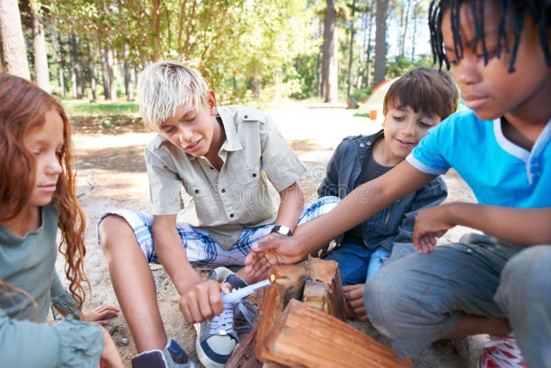Getting Ready for the Night. a Group of Children Preparing a Fire at ...