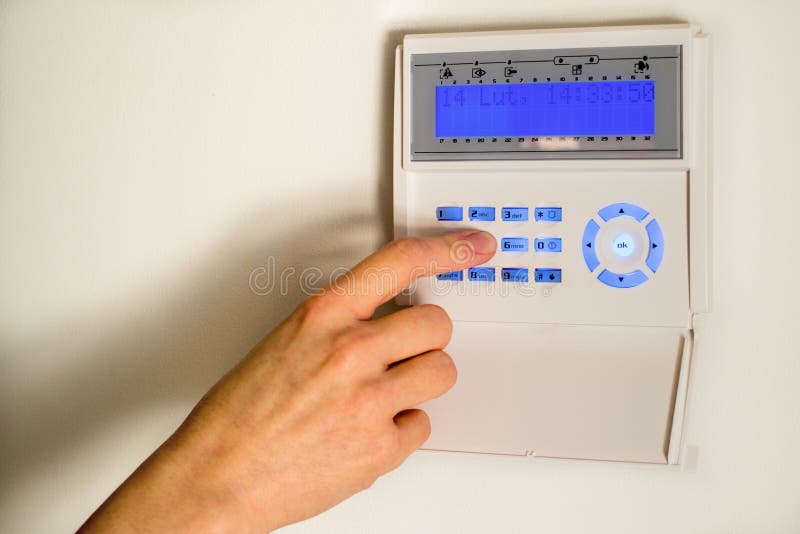 Getting Ready To Set Home Alarm Stock Photo - Image of security, button ...