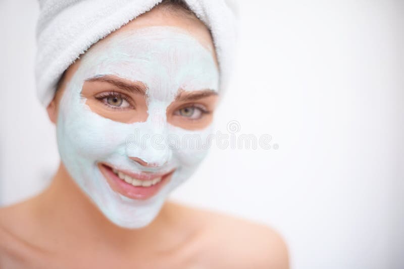 Getting Rid of All Impurities. a Young Woman Wearing a Facemask. Stock ...