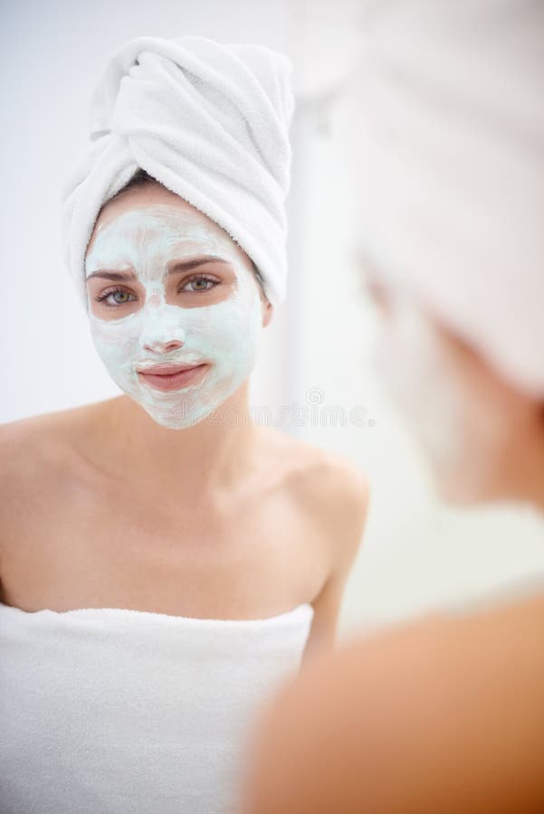 Getting Rid of All Impurities. a Young Woman Wearing a Facemask. Stock ...