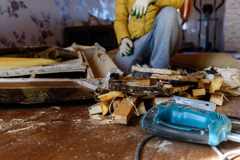 Getting Rid of Old Things. Disassembling an Old Sofa in the Attic. Stock Photo - Image of ...