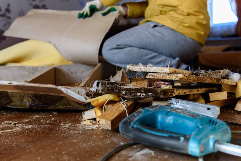 Getting Rid of Old Things. Disassembling an Old Sofa in the Attic ...
