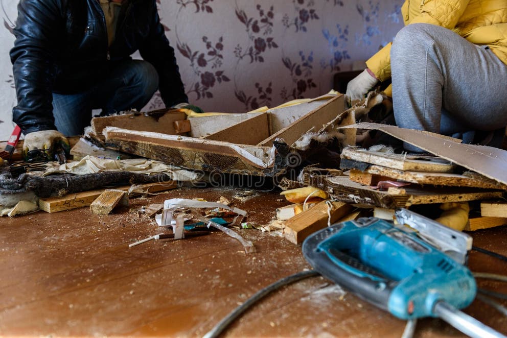 Getting Rid of Old Things. Disassembling an Old Sofa in the Attic ...