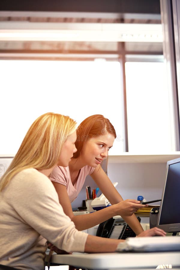 Getting a Second Opinion. Two Female Coworkers Working in the Office. Stock Image - Image of ...
