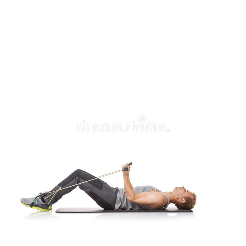 Getting in Shape. a Young Man Working Out with a Resistance Band. Stock ...