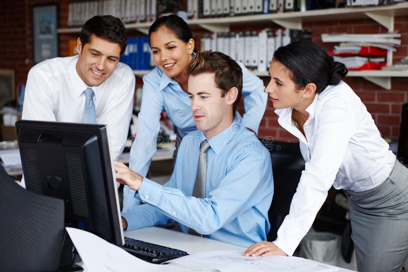Getting Some Help from His Colleagues. a Young Business Team ...
