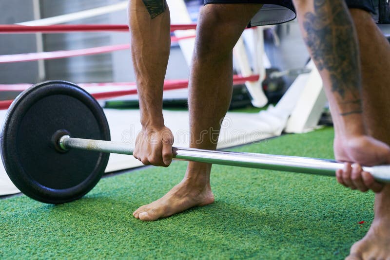 Getting Stronger with Every Lift. an Unrecognizable Man Going through ...