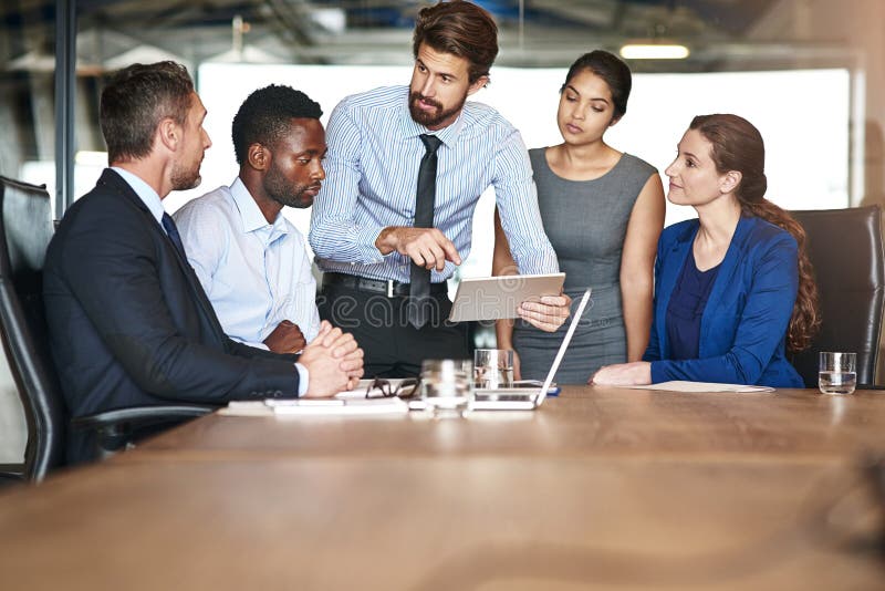 Getting the Teams Input. a Group of Corporate Colleagues Talking ...