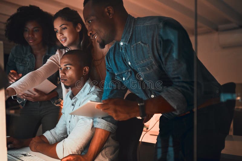 Getting the Teams Input. a Group of Young Designers Working Together on ...