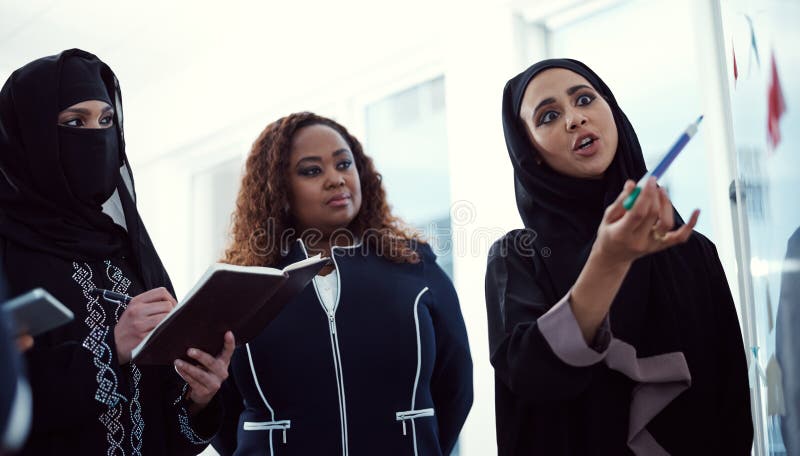 Getting Their Input. Low Angle Shot of a Group of Diverse Business ...