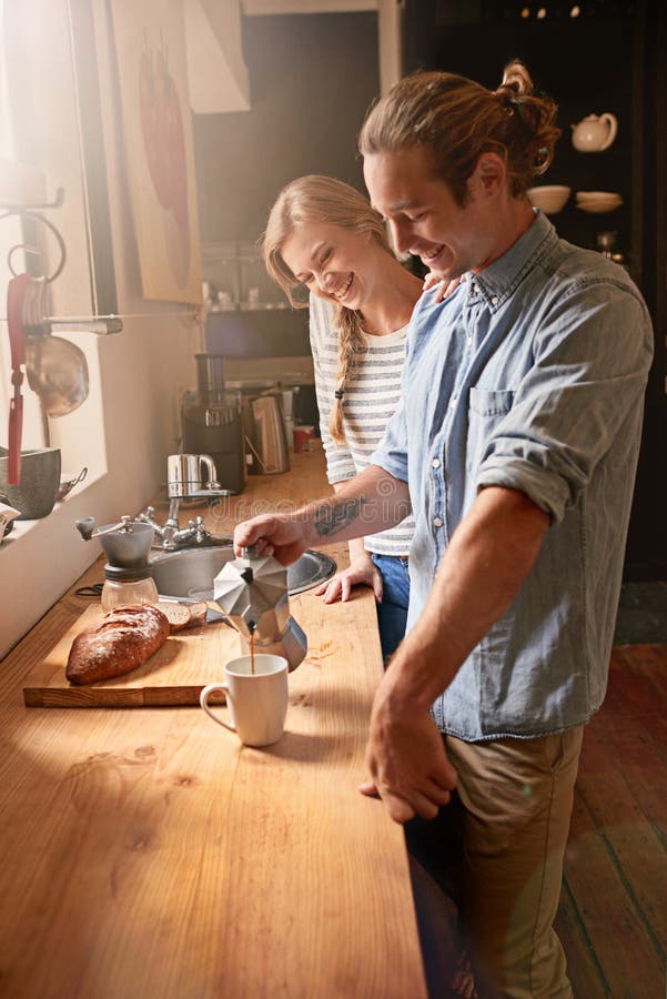 Getting Their Morning Started Together. a Young Couple in the Kitchen. Stock Image - Image of ...