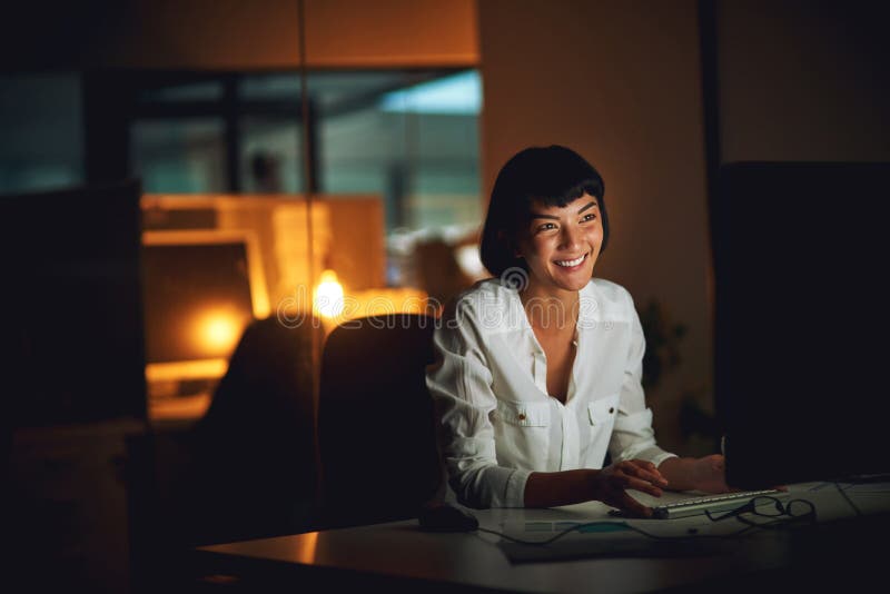 Getting Things Done Sure Feels Good. a Young Businesswoman Using a ...