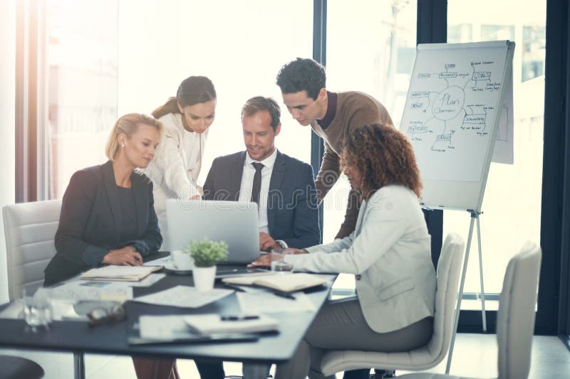 Getting Things Done with Teamwork. a Group of Corporate Businesspeople ...