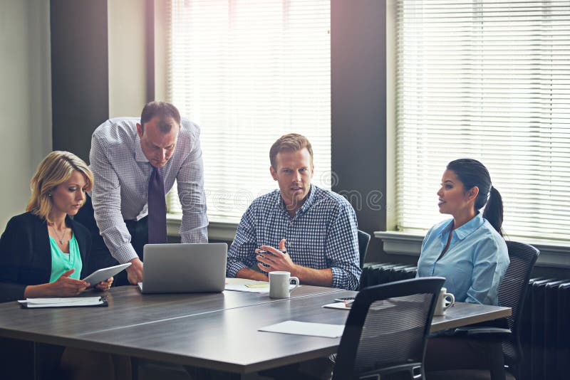 Getting Things Done is What they Do Best. a Group of Colleagues Having ...