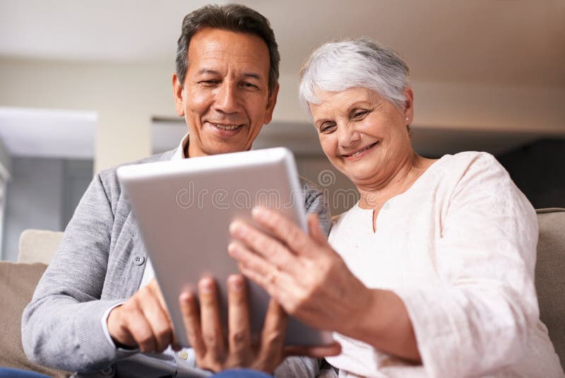 Getting To Know the World of Technology. a Senior Couple Using a ...