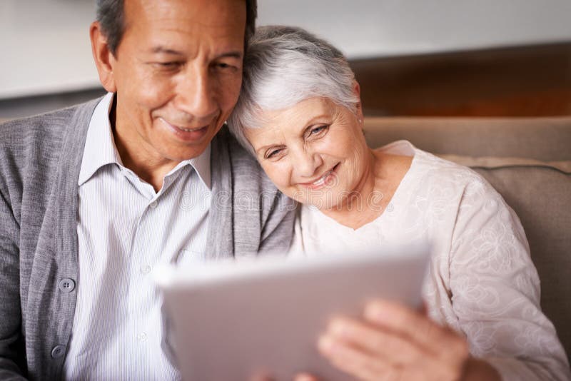Getting To Know the World of Technology. a Senior Couple Using a ...