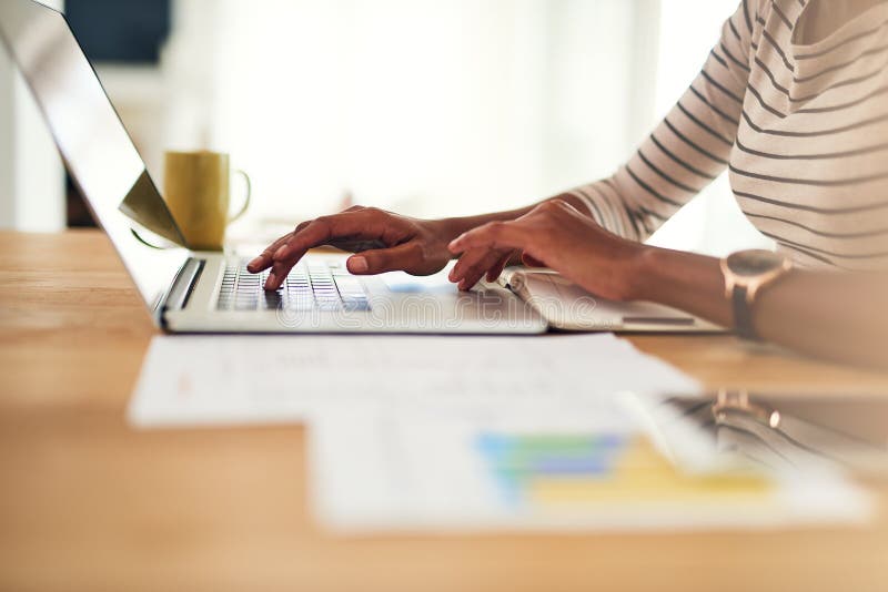 Getting To Work on a New Project. an Unrecognizable Woman Working on ...