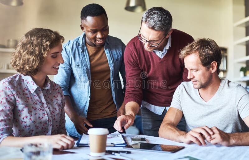 Getting Together To Get Things Done. a Creative Team Having a ...