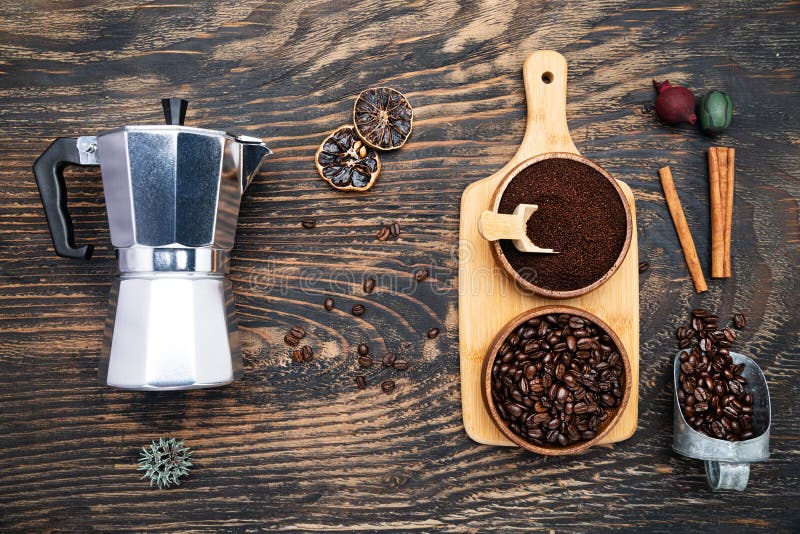 Geyser Coffee Maker, Coffee Beans and Ground Coffee on a Dark Wooden ...