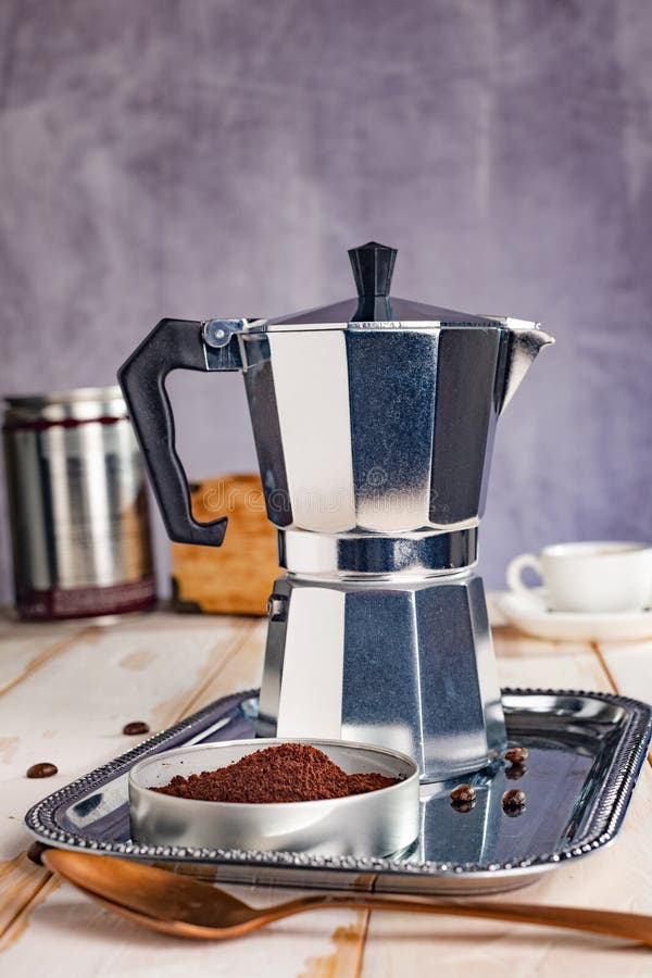 Geyser Coffee Maker Stands on a White Kitchen Table. Everything is ...