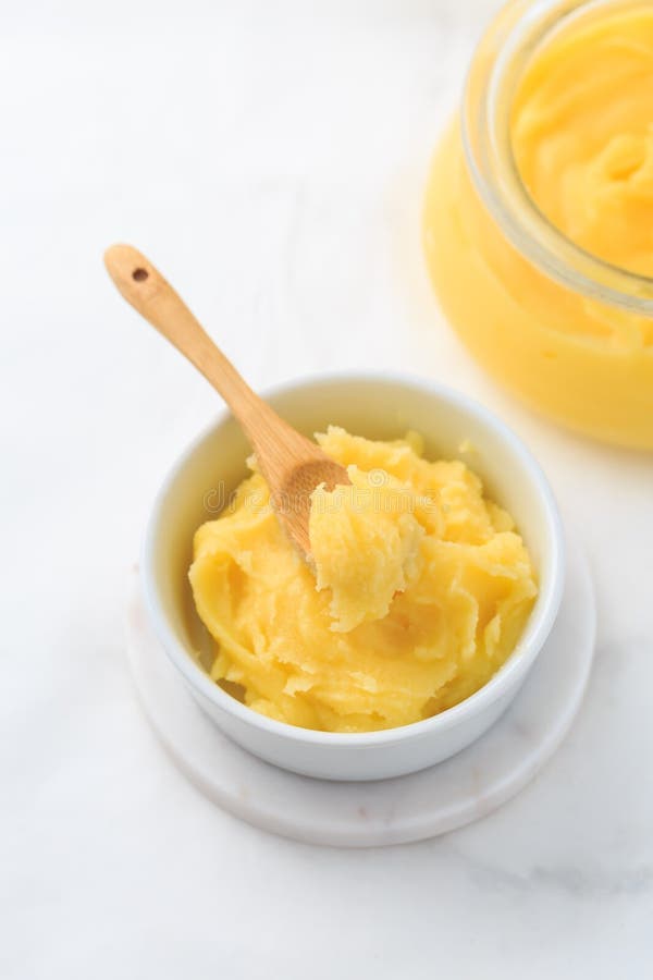 Ghee or Clarified Butter in Jar and Bowl. Indian Butter Stock Image ...