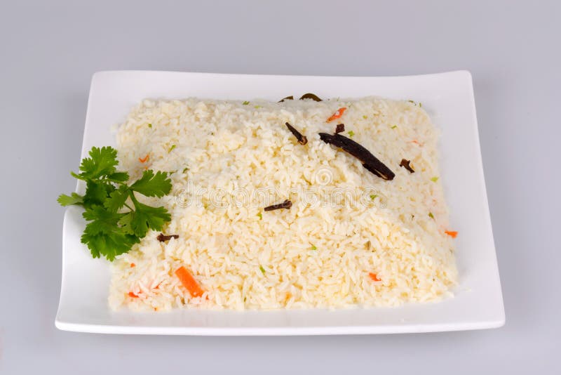 Ghee rice on white plate stock image. Image of coriander - 61603163