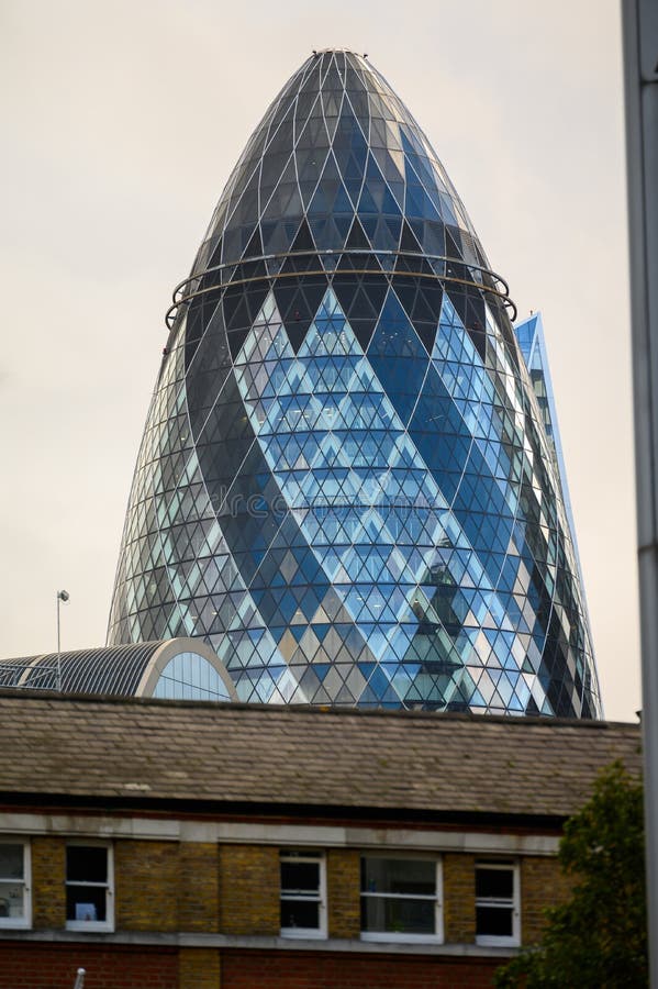 The Gherkin Building Seen Above Rooftops Editorial Photography - Image ...