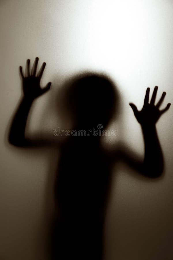 Ghost Concept Shadow of a Child Behind the Matte Glass Blurry Hand ...