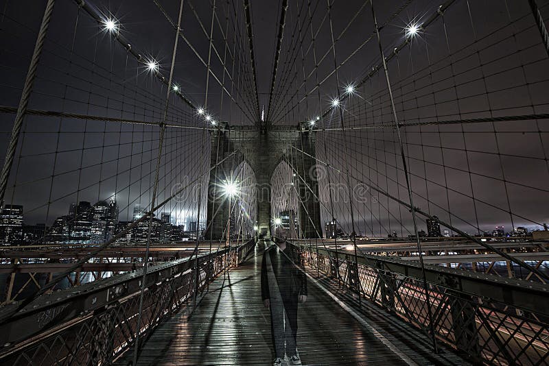 Ghost Like Figure on Brooklyn Bridge at Night Stock Image - Image of ...