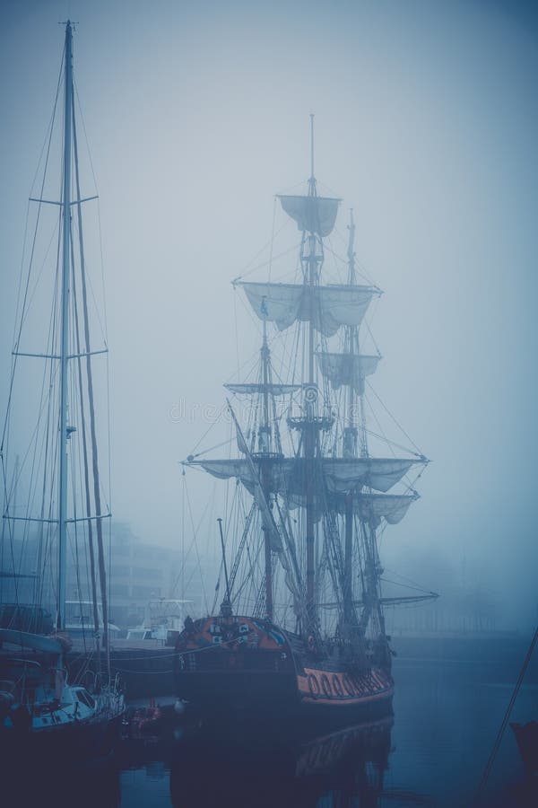 A Ghost Ship Moored in the Misty Port of La Rochelle Stock Image ...