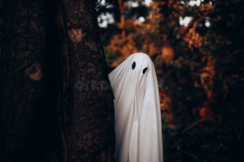 Ghost Standing Behind the Tree in Forest Stock Image - Image of ...