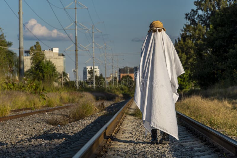 Ghost on Train Tracks with Train Passing Behind, at Sunset, Mexico ...