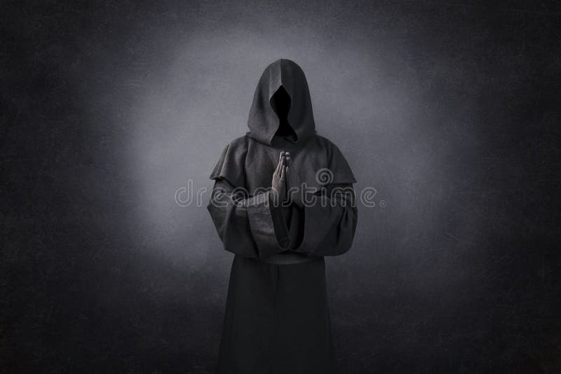 Ghostly figure praying stock image. Image of horror - 208320021