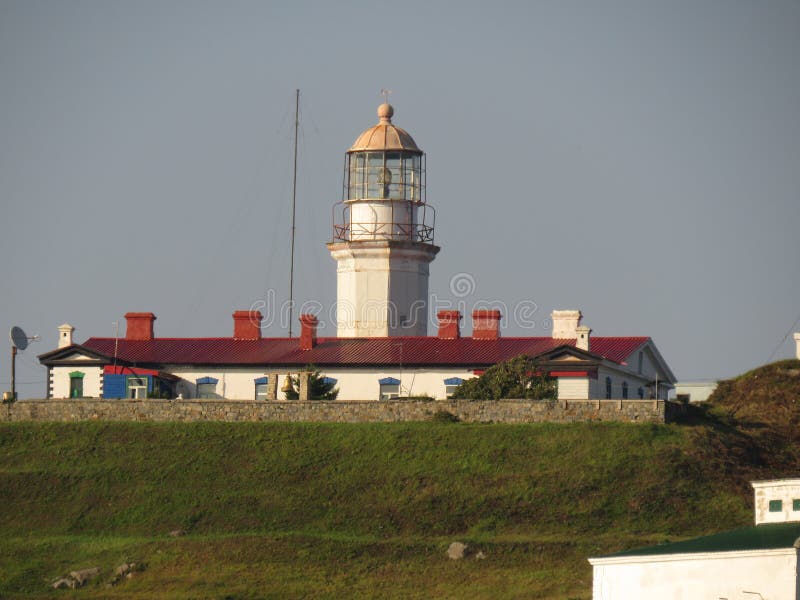 Lighthouse on the Green Cliff Closeup Stock Image - Image of safety ...