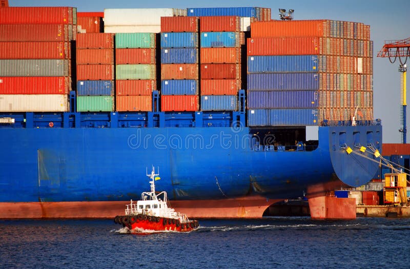 Giant Blue Container Ship and Small Red Tugboat Stock Photo - Image of ...