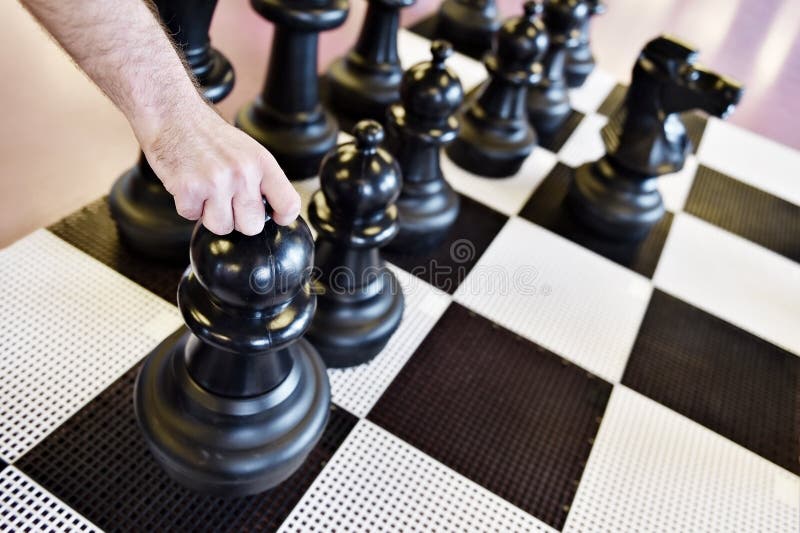 Giant Chess Game with Pawn Move Stock Photo - Image of leisure, sport ...