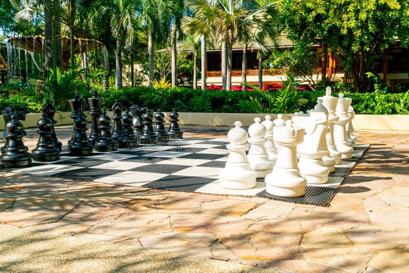 Giant chess on playground stock photo. Image of battle - 206811000