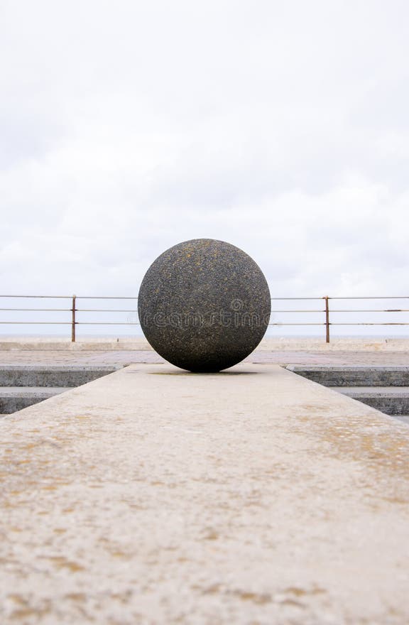 A Giant Concrete Ball on the Seafront Wall Stock Photo - Image of ...