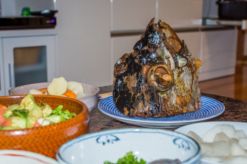 Giant fish head on a plate stock photo. Image of weird - 110424146