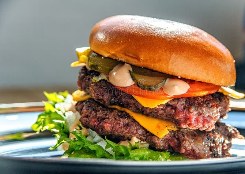 Giant Juicy Double Burger, Closeup Stock Image - Image of hamburger ...