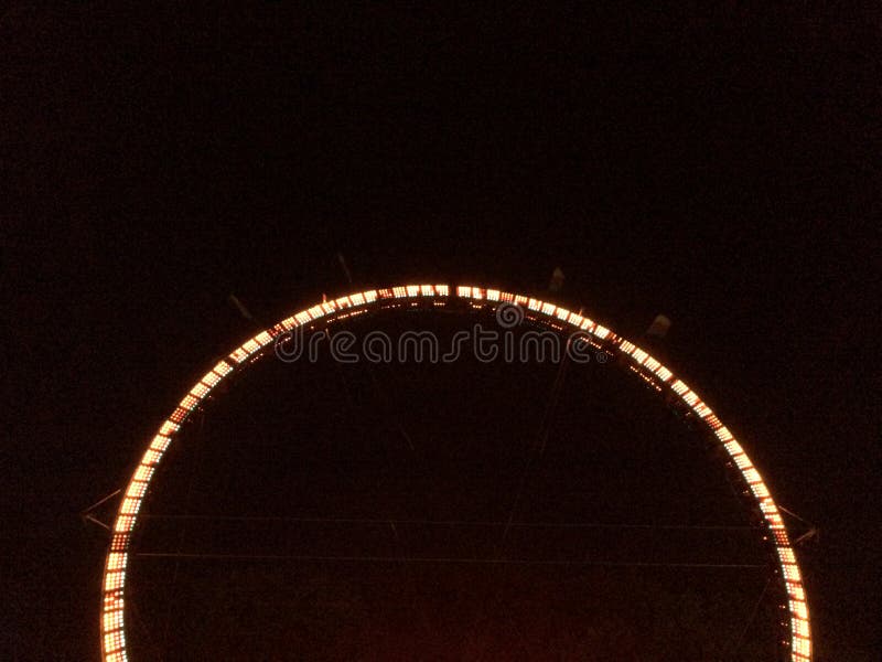 Giant Loop Ride at Fairgrounds at Night Stock Photo - Image of ...