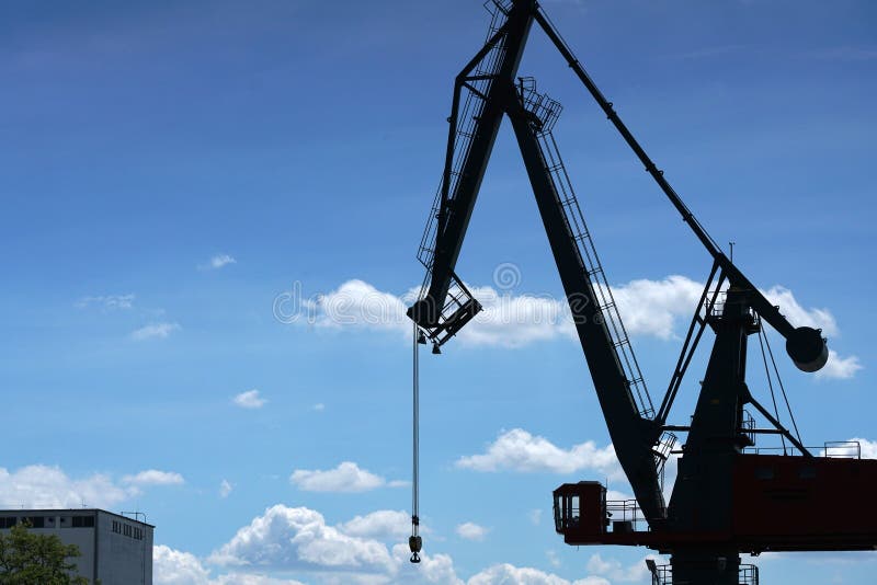 Giant Metallic Crane in the Blue Cloudy Sky Stock Image - Image of ...