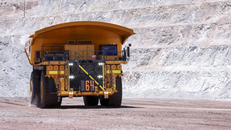 Giant Mining Truck Transporting Minerals in an Open Pit Mine Stock ...